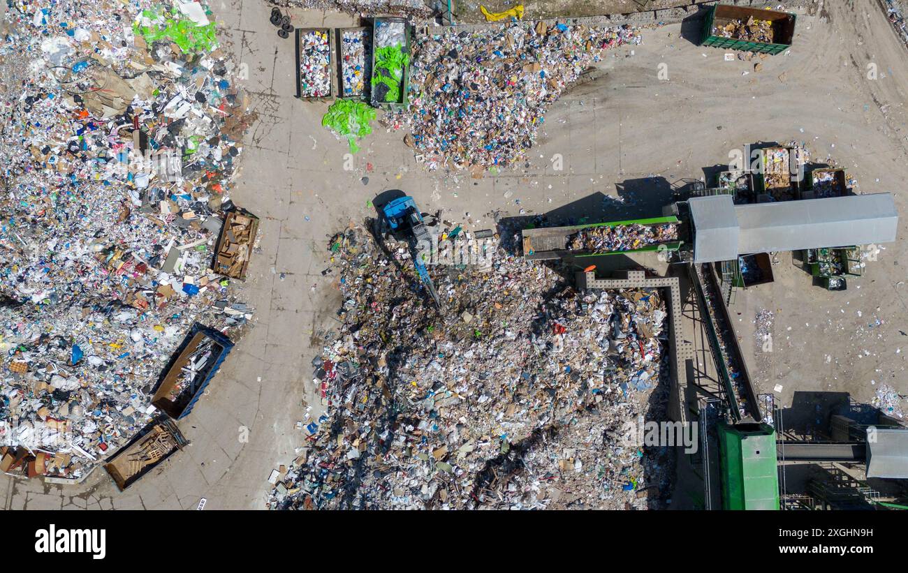 Drone photography of recycling center and machinery sorting material ...