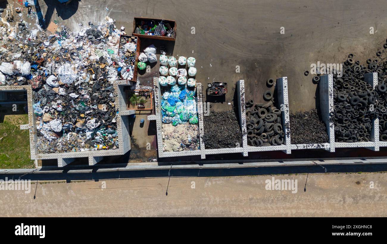 Drone photography of recycling center and machinery sorting material ...