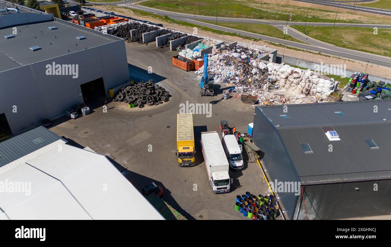 Drone photography of recycling center and machinery sorting material ...