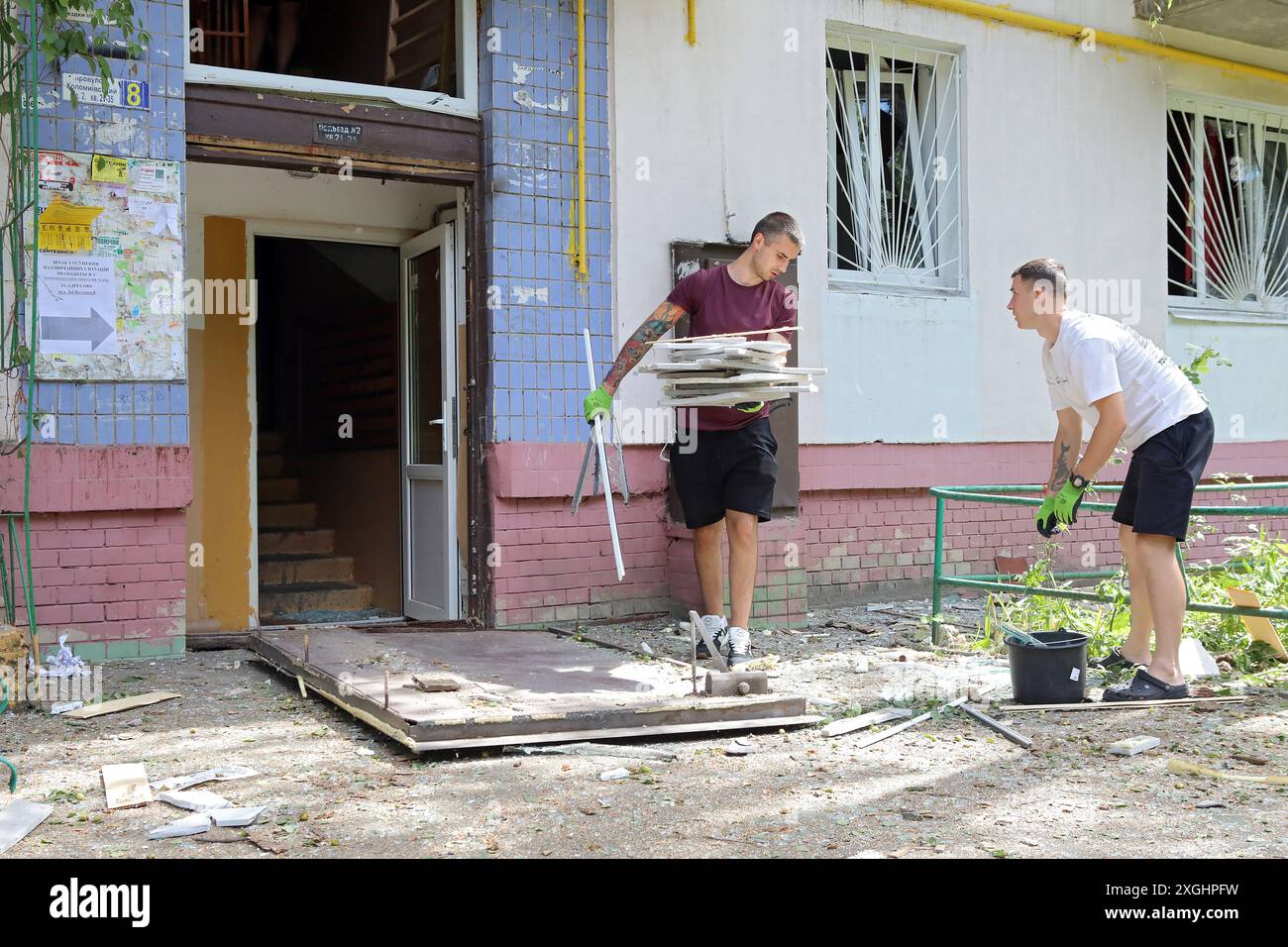KYIV, UKRAINE - JULY 8, 2024 - People collect the rubble at a five ...