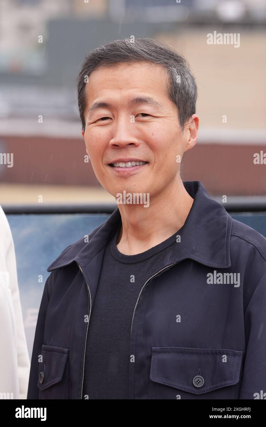 Director Lee Isaac Chung during a photo call for Twisters, at 55 ...