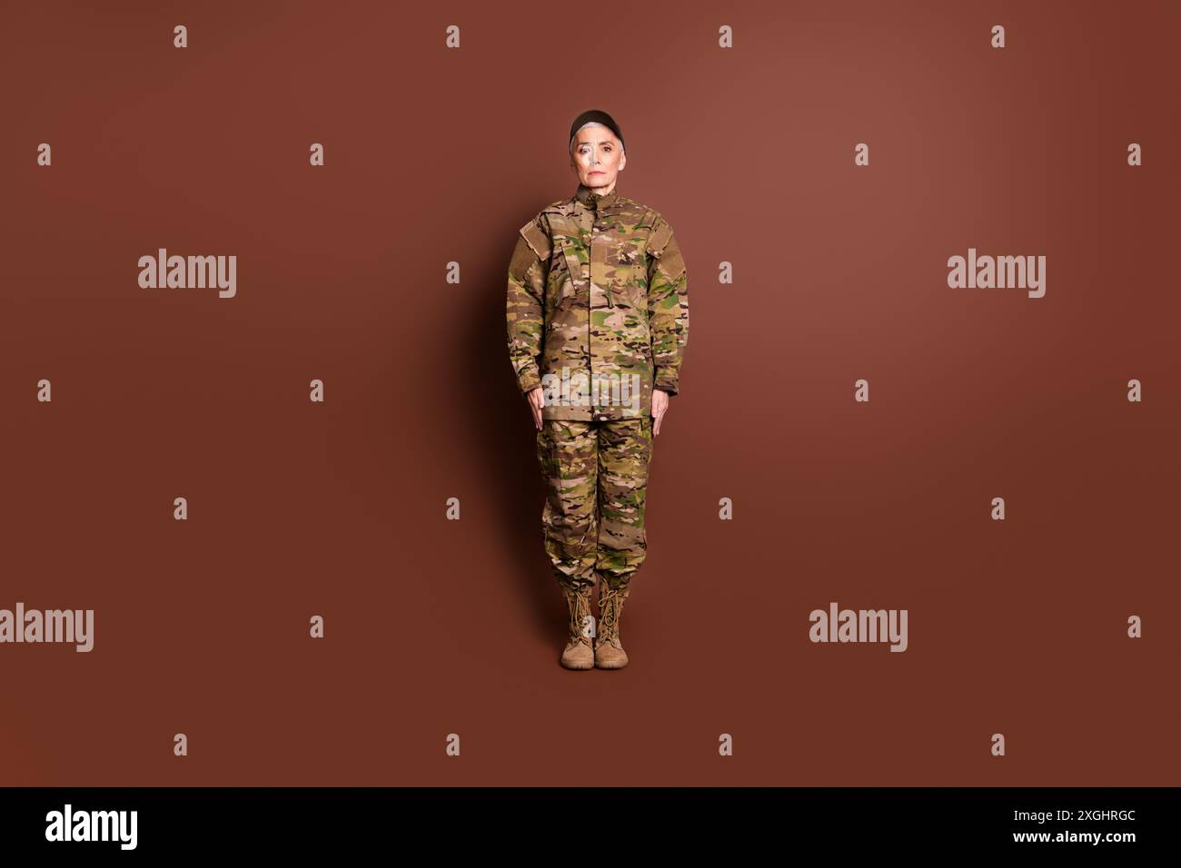 Full size photo of pretty senior female courageous servicewoman stand ...