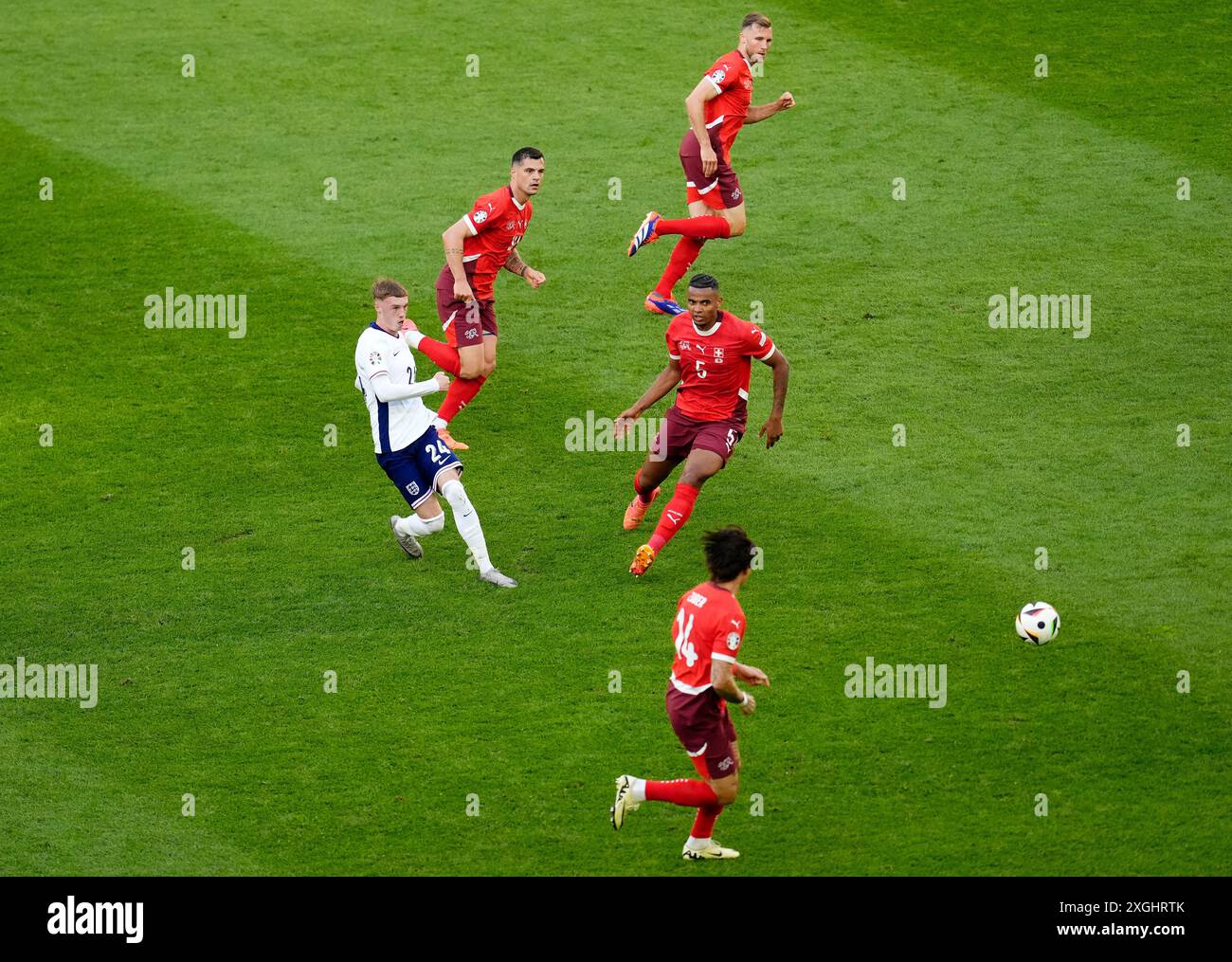 England's Cole Palmer (left) and Switzerland's Manuel Akanji and team ...