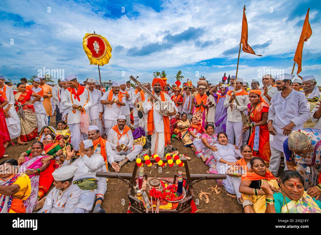 Devotees participate in the vibrant Wari Palki Yatra at Pandharpur, a ...