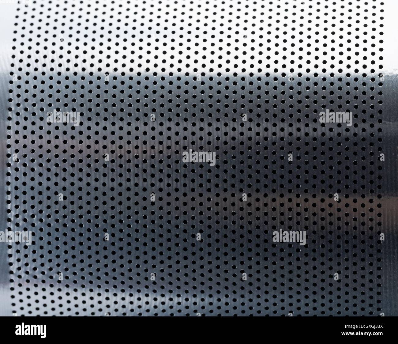 Metallic perforated texture background macro close up view Stock Photo - Alamy