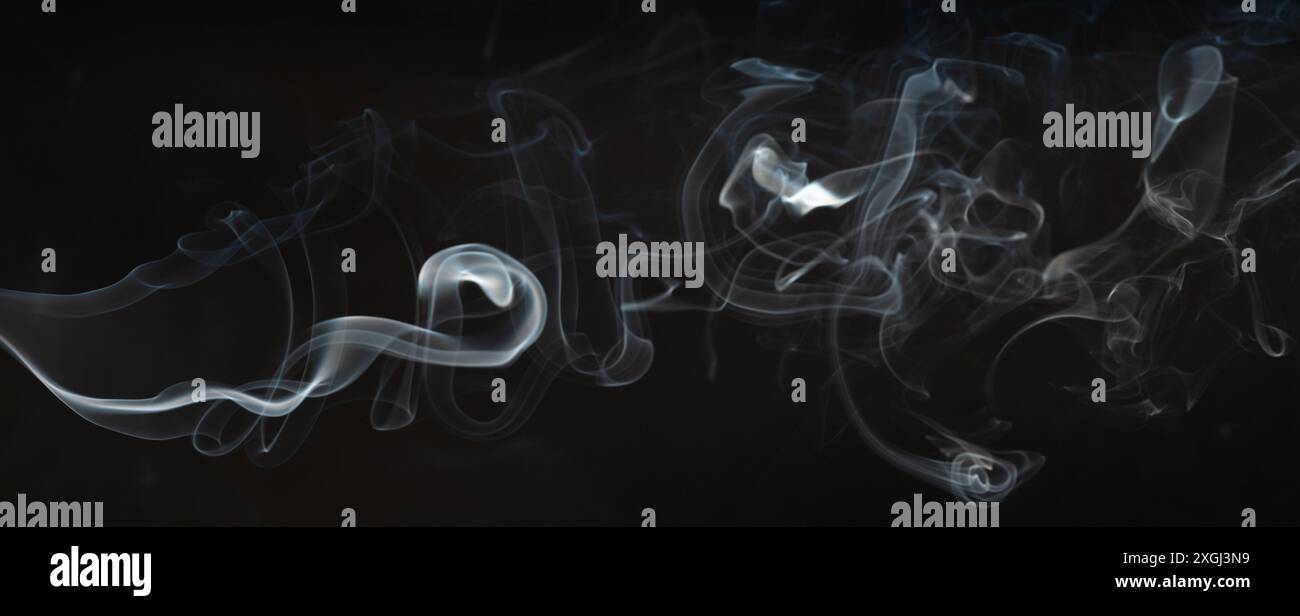 Curly form shape smoke steam close up view Stock Photo - Alamy