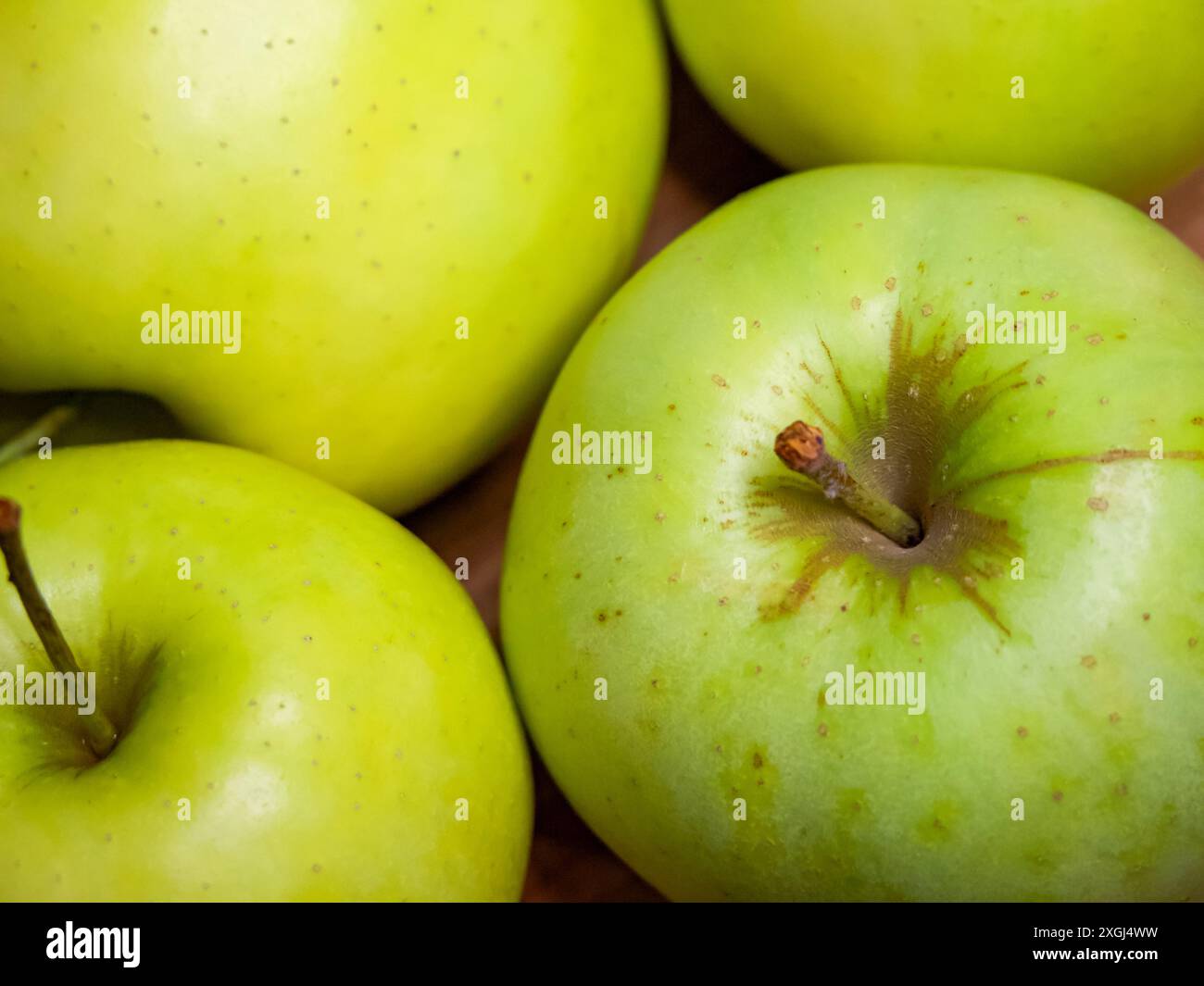 The apples vibrant color and texture indicate freshness, suitable for a ...