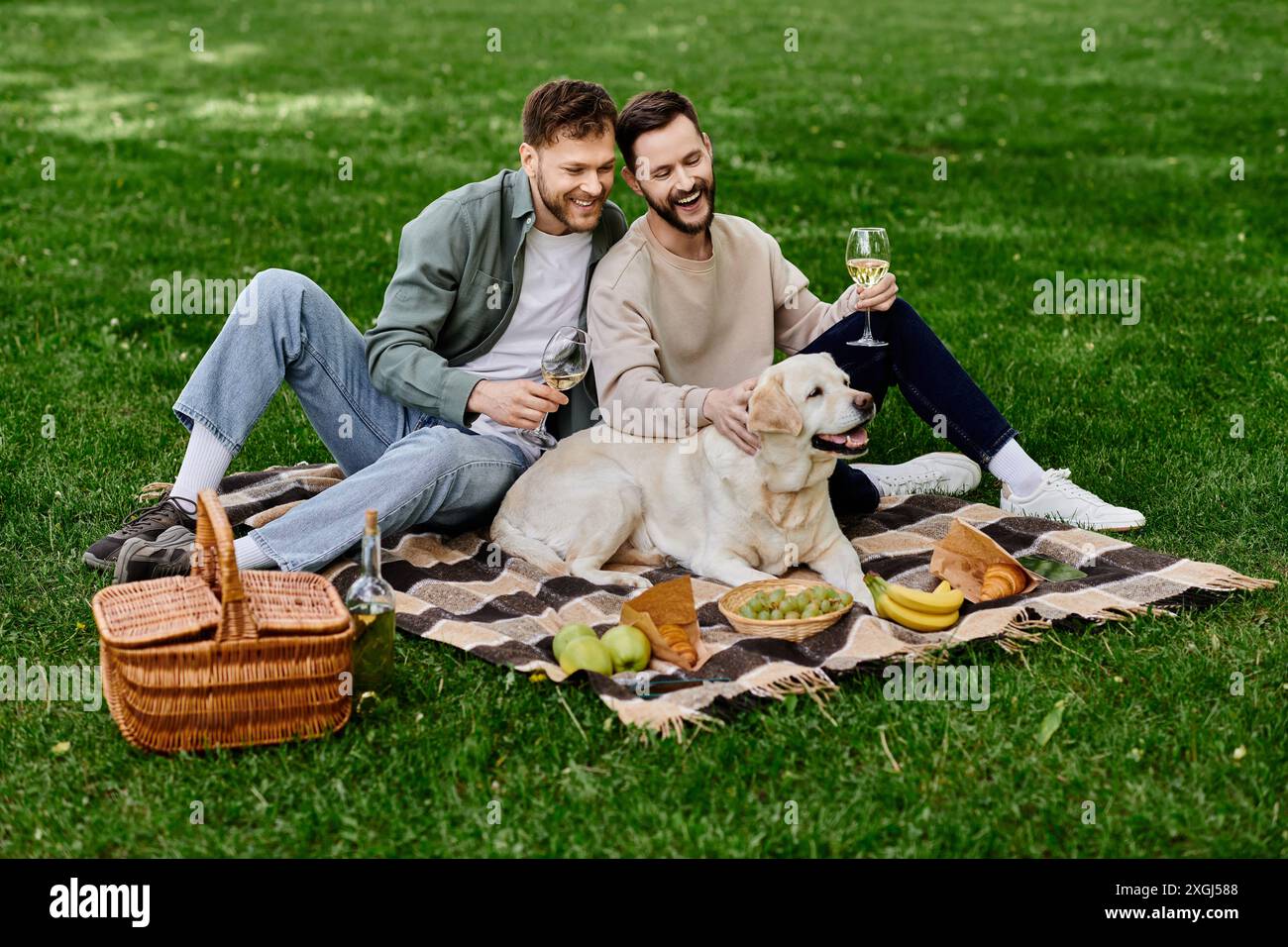 A bearded gay couple enjoys a picnic in a green park with their ...