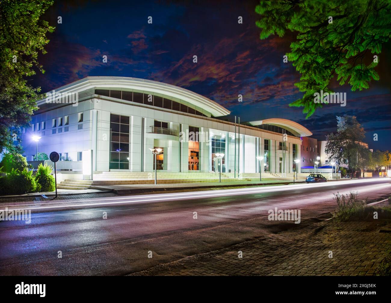 Gaborone, capital of Botswana, night time, building and cars trail ...