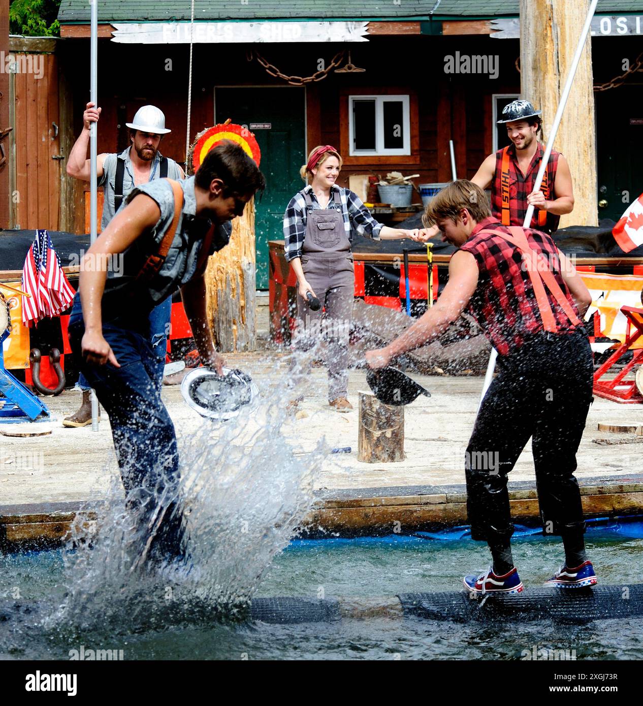 Ketchikan, Alaska, USA - 1st July 2023:Lumberjacks having a water fight ...