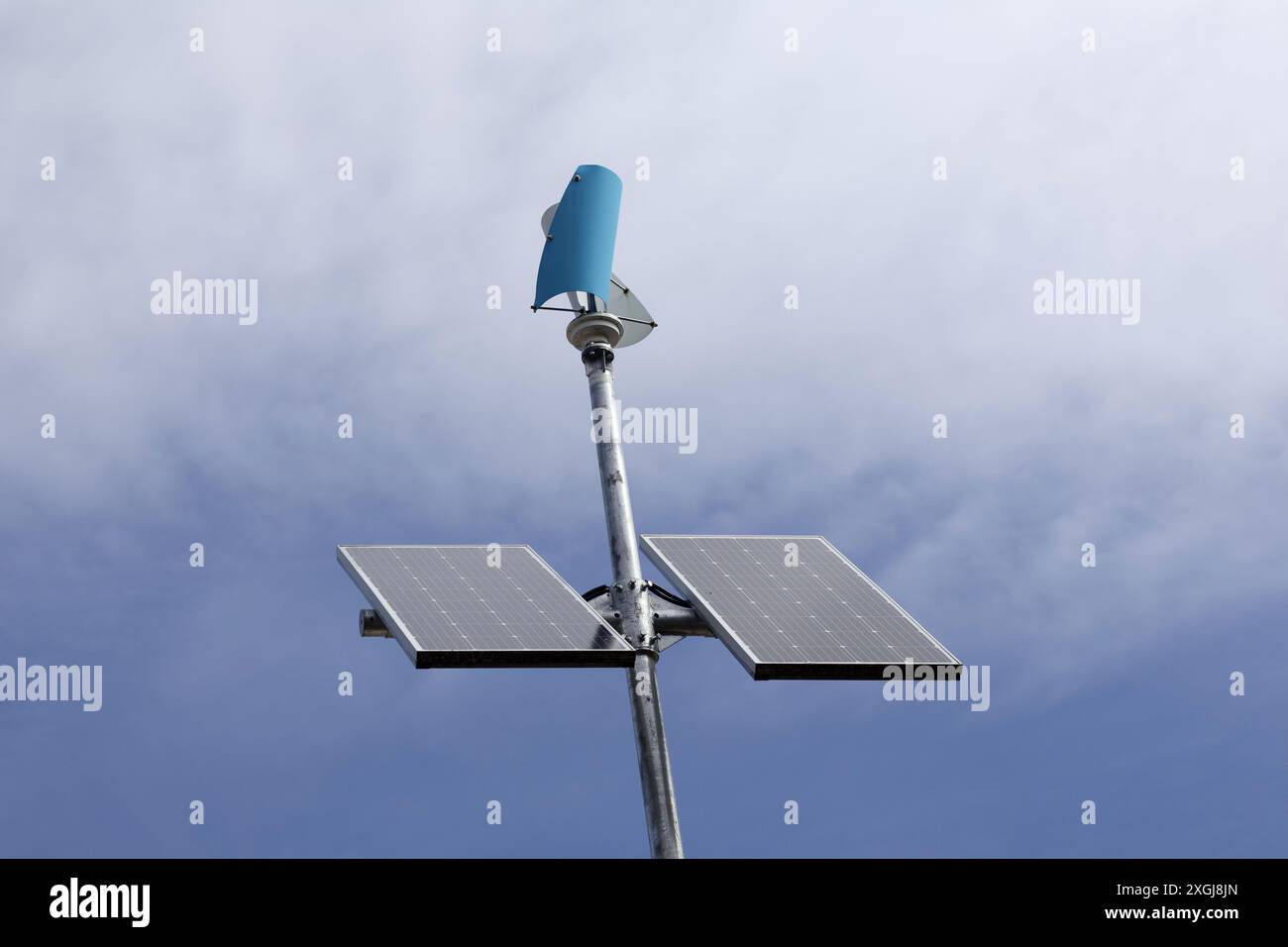 wind solar panel against blue sky Stock Photo - Alamy