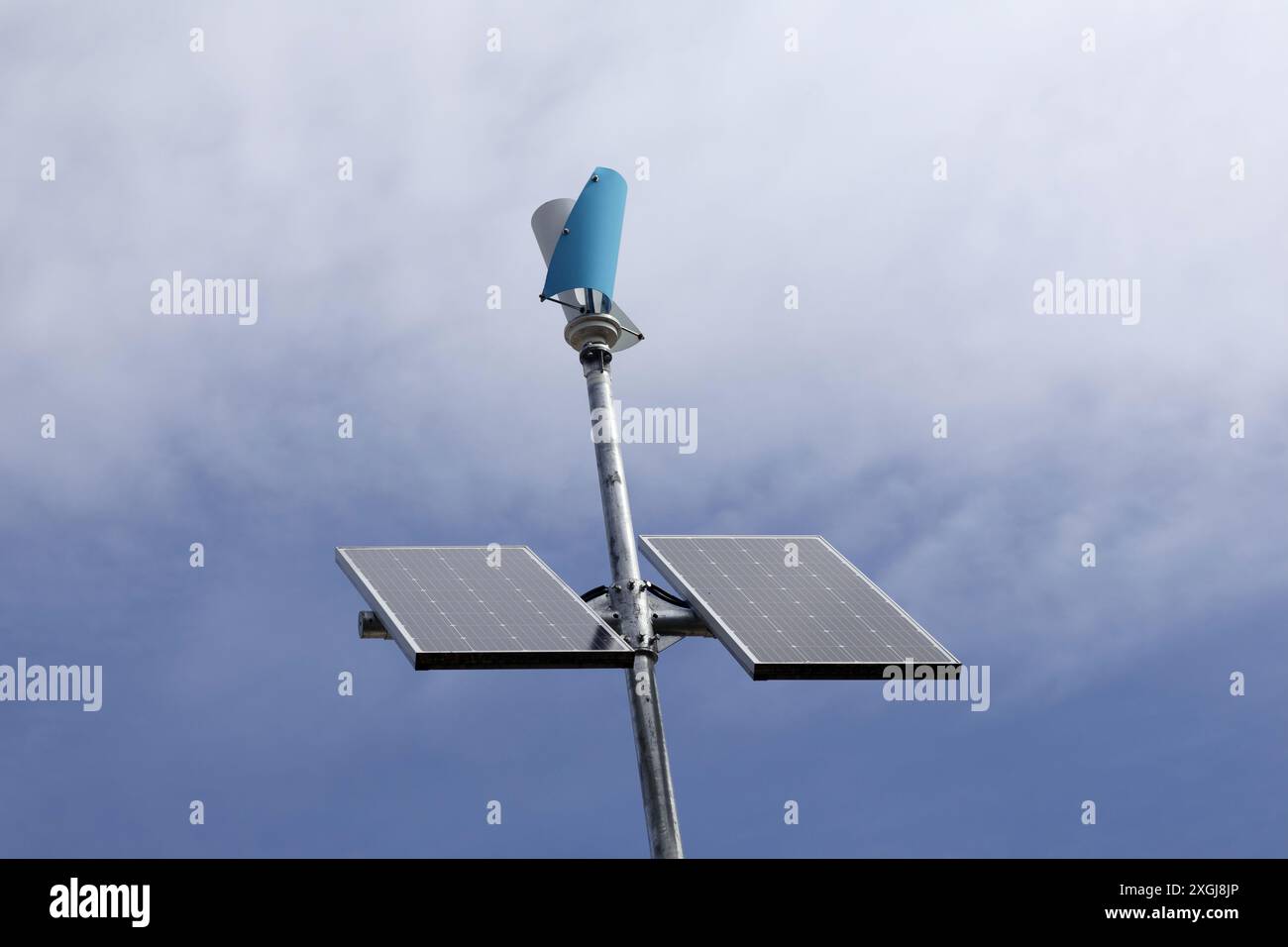 wind solar panel against blue sky Stock Photo - Alamy