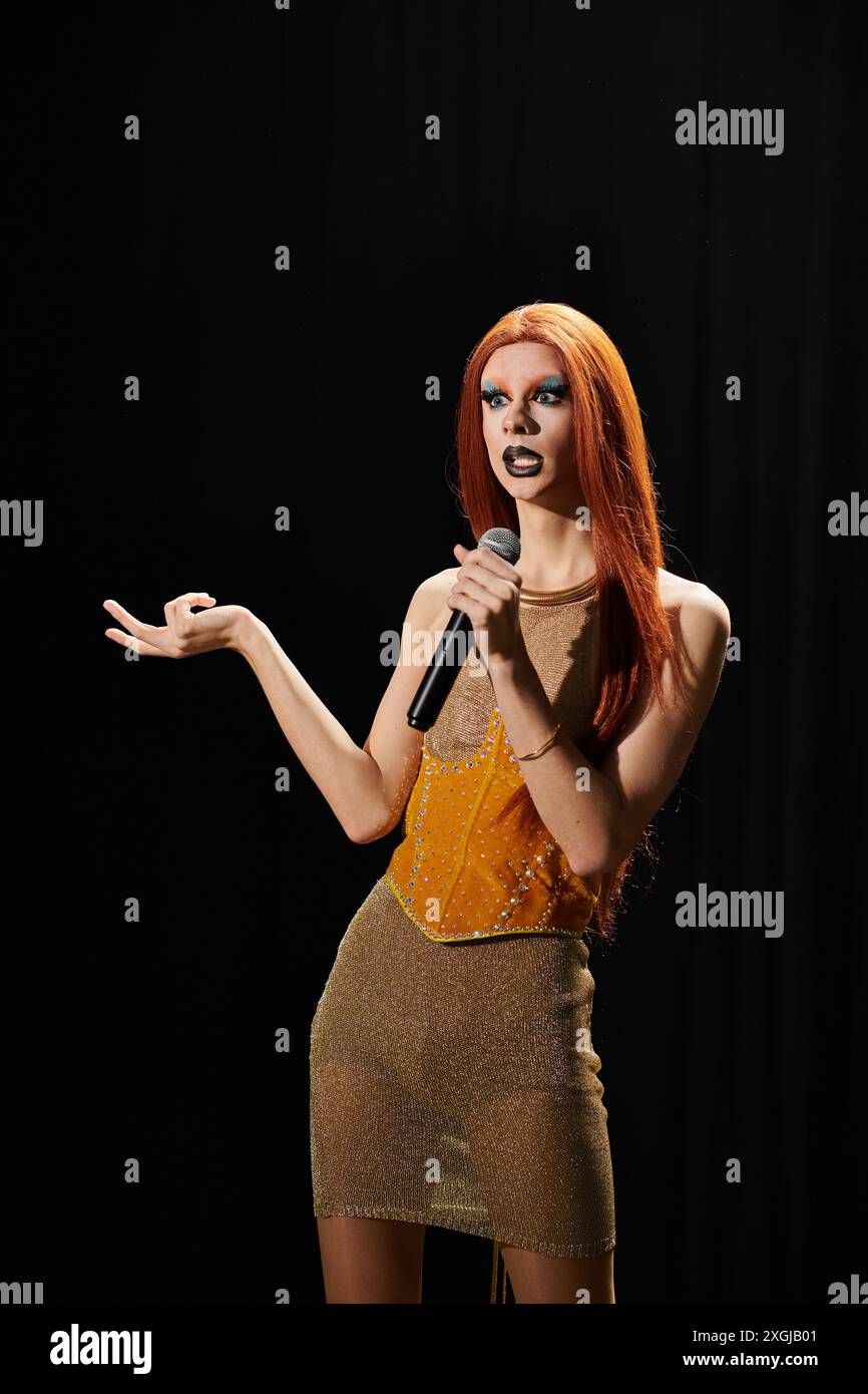 A drag queen performs on stage, holding a microphone and captivating ...