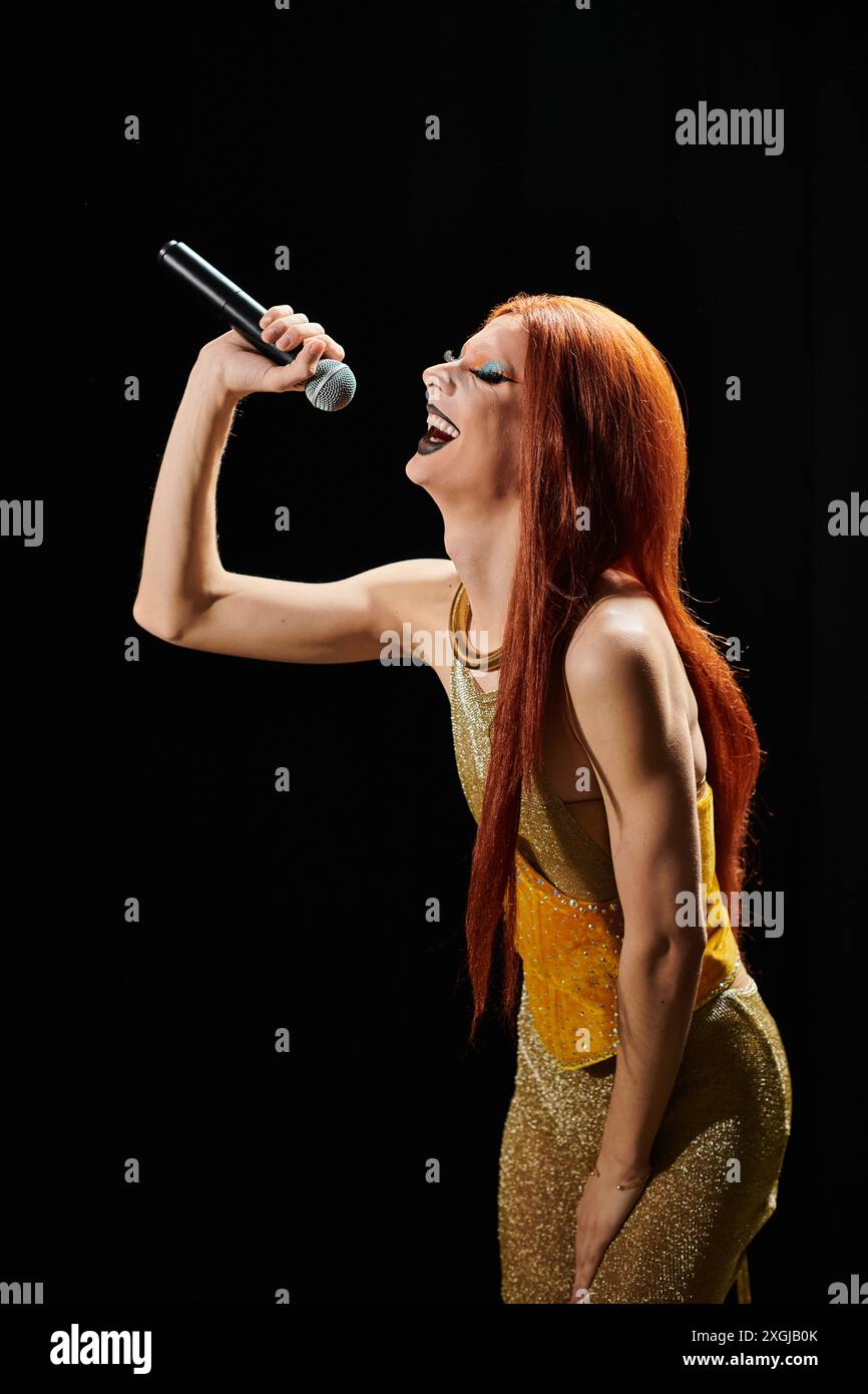 A drag performer sings into a microphone, wearing a sparkling gold gown ...