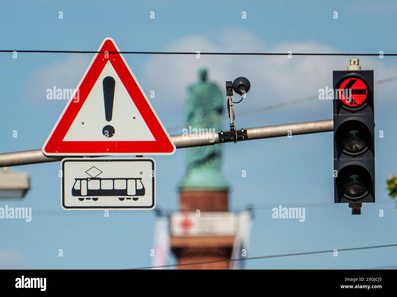 Darmstadt, Germany. 09th July, 2024. A small camera between a warning ...