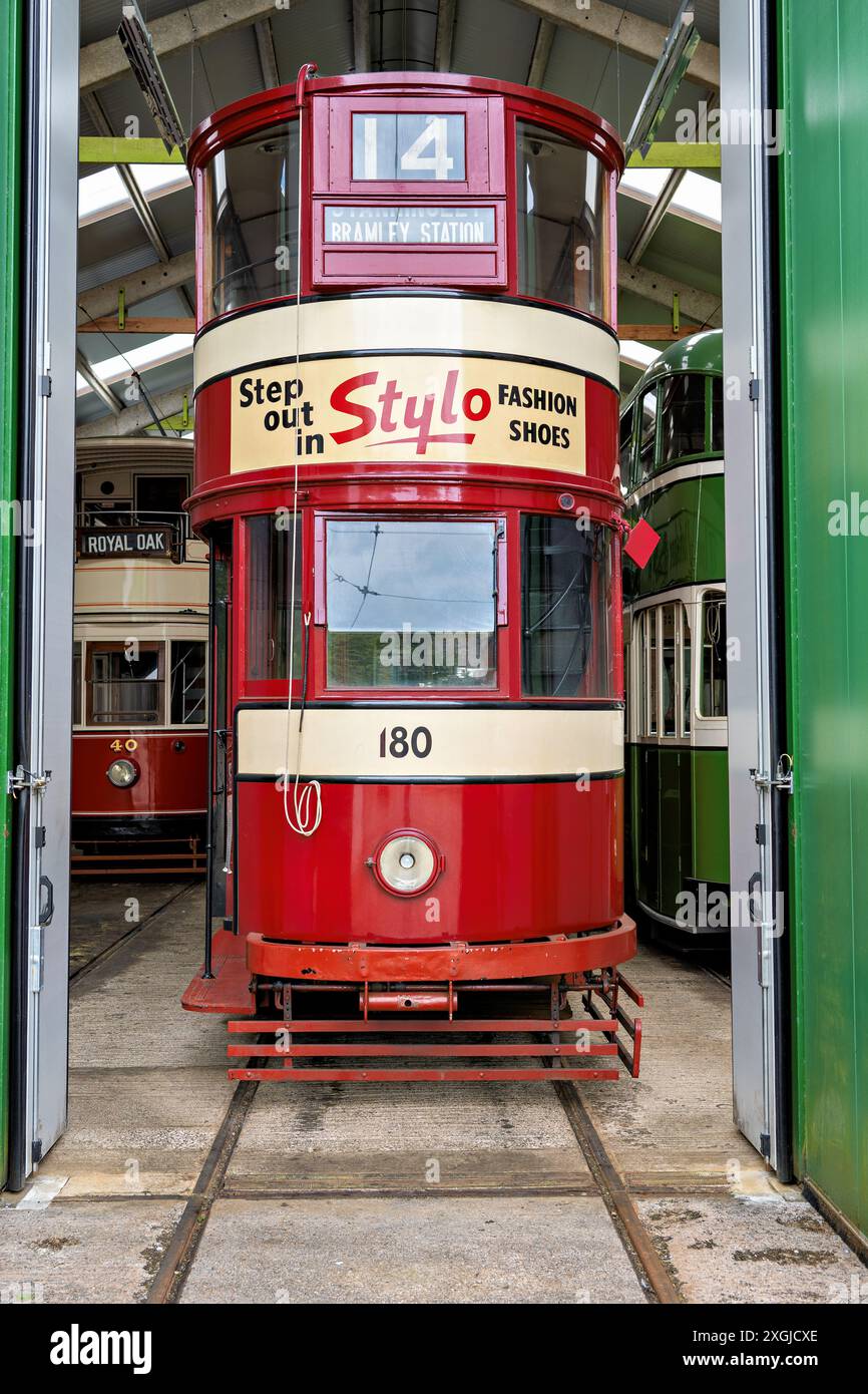 Vintage red tram parked in a depot Crich Derbyshire UK, showcasing ...