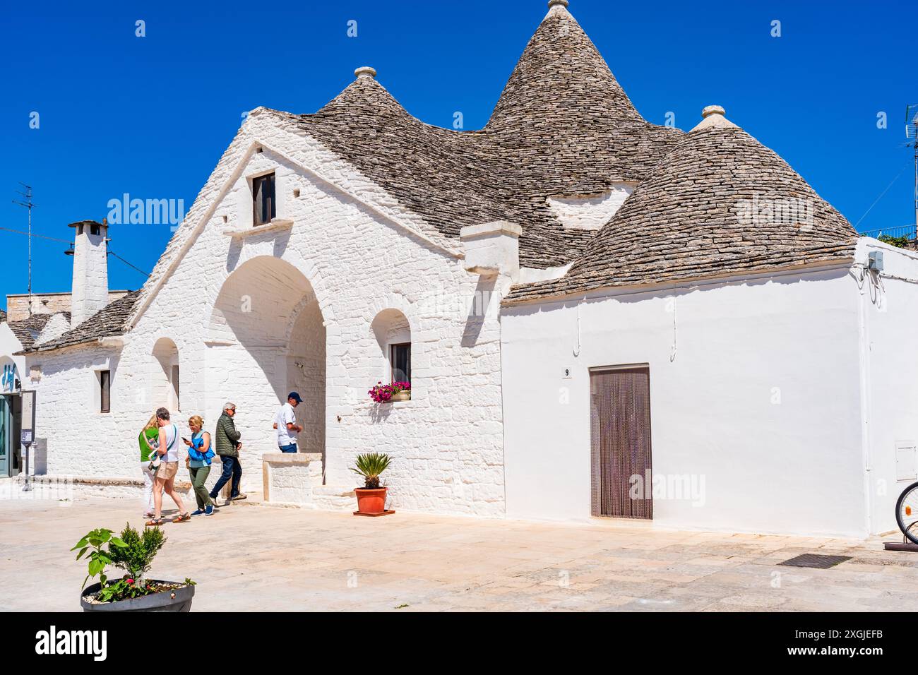 ALBEROBELLO, ITALY - MAY 17, 2024: Famous old dry stone Trullo Sovrano ...