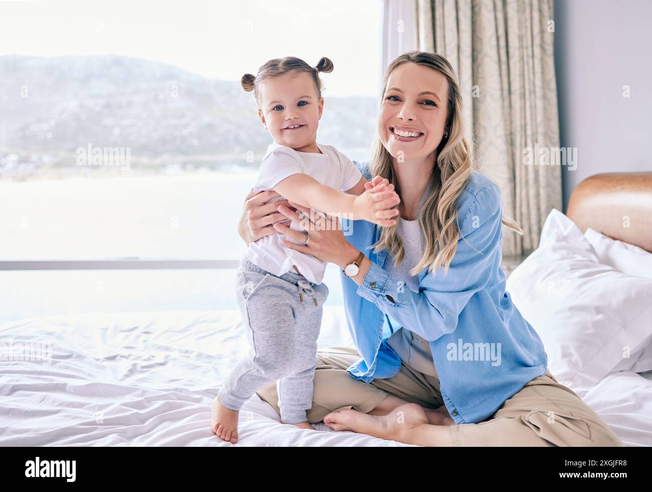 Woman, portrait and baby in home on bed for bonding, help and ...