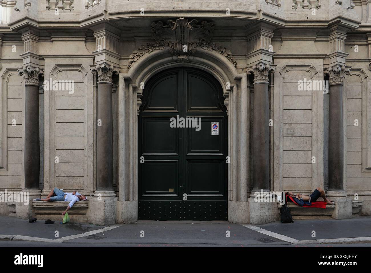 TWO HOMELESS PEOPLE IN A STREET IN THE HISTORIC CENTER Stock Photo - Alamy