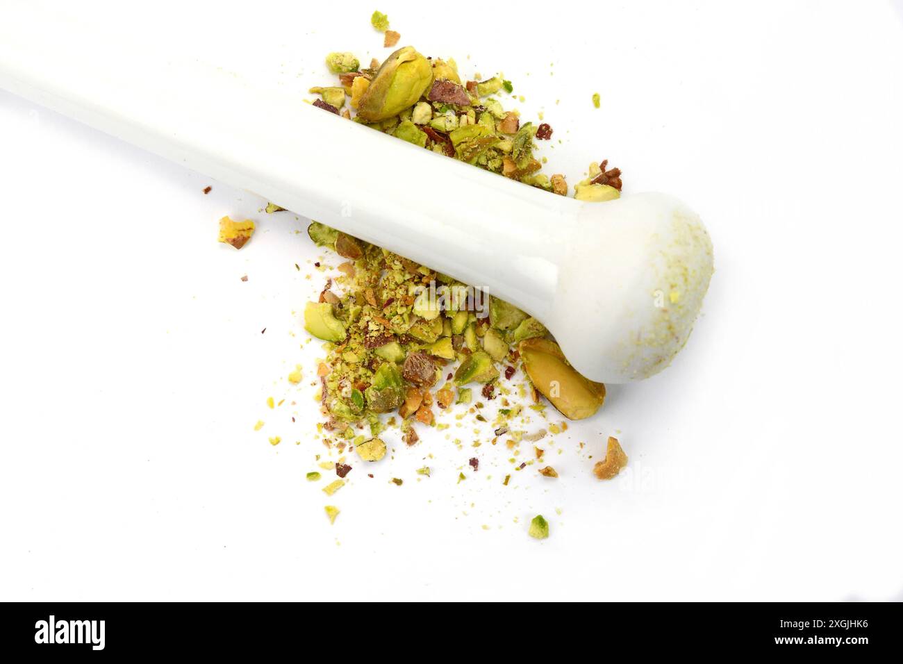 Ground, milled, crushed or granulated pistachio pile with mortar ...