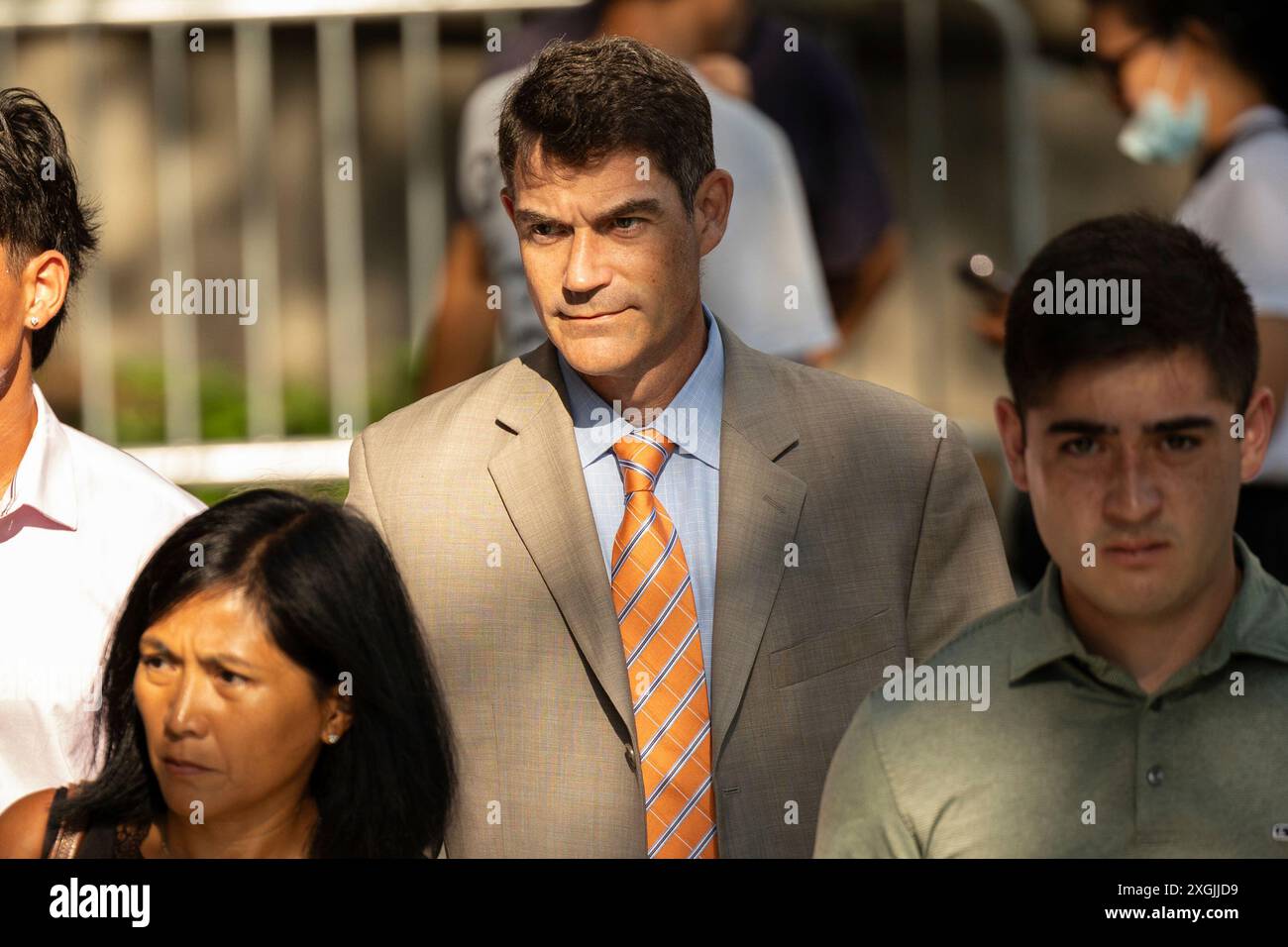 Patrick Halligan, center, former chief financial officer of Archegos ...