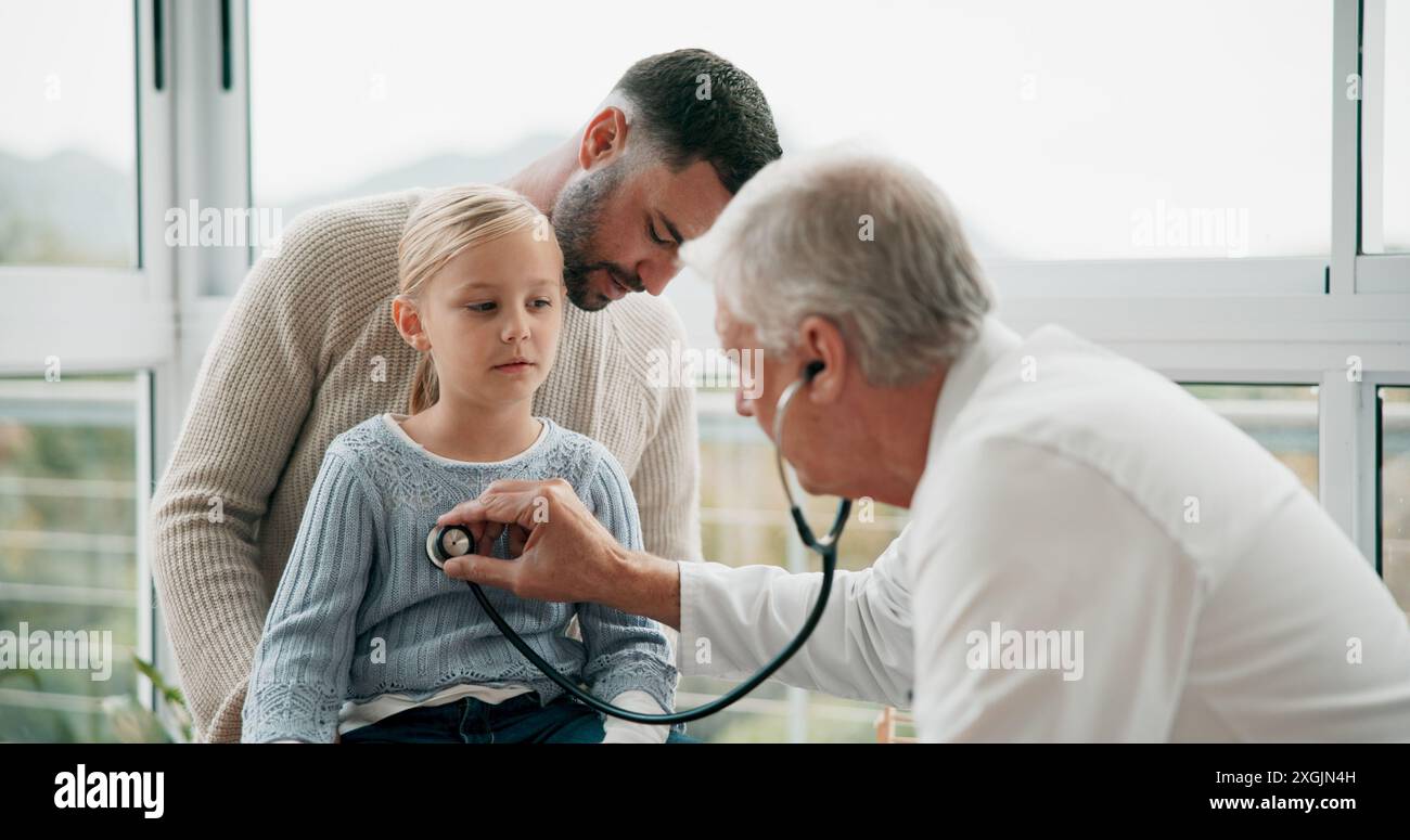 Doctor, father and girl child with stethoscope for breathing check in ...