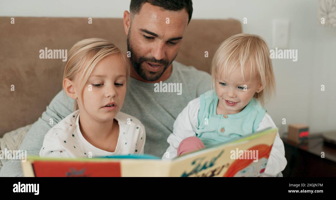 Father, children and reading in bed for storytelling, literature and family bonding at bedtime ...