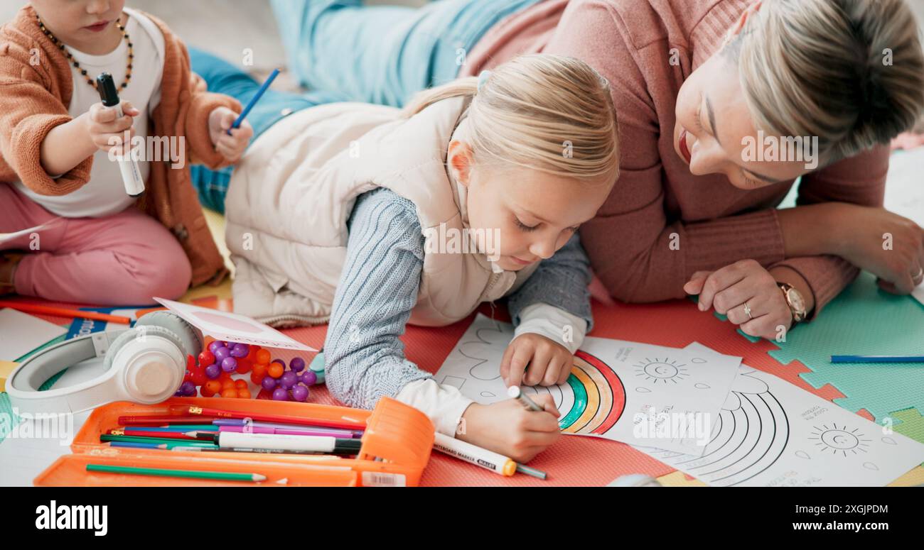 Mother helping children drawing sketch hi-res stock photography and ...