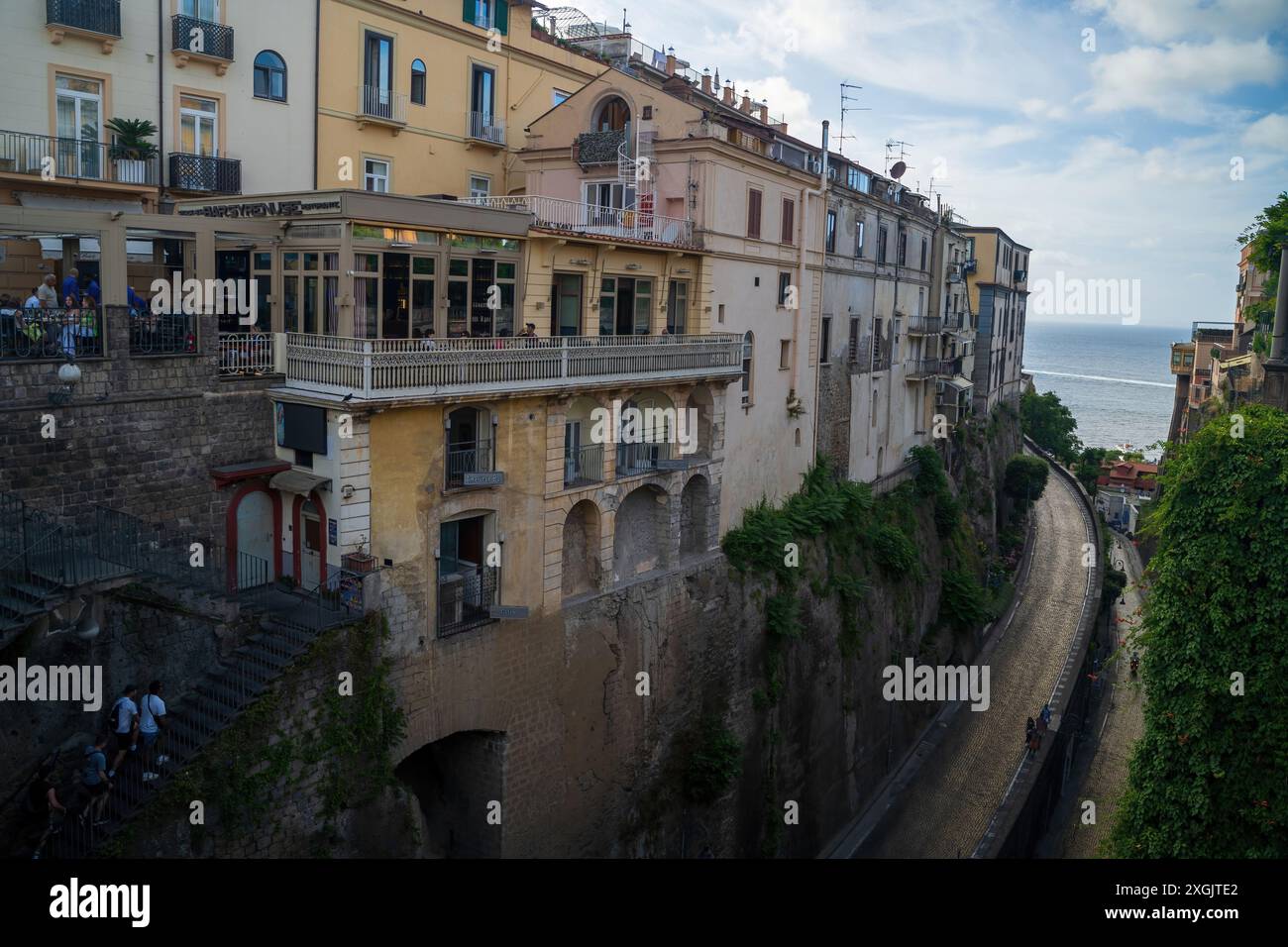 A captivating view of a historic street in Sorrento, Italy, bordered by ...