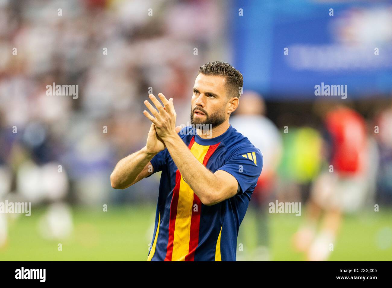 Munich, Germany. 09th July, 2024. Nacho of Spain is warming up before ...