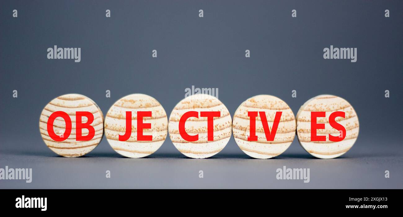 Objectives symbol. Concept word Objectives on beautiful wooden circles ...