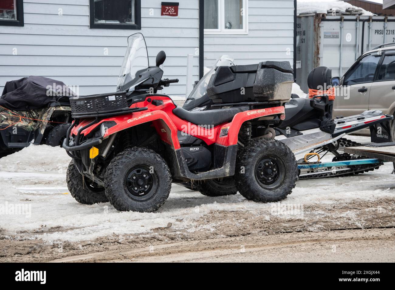 Red ATV parked in Iqaluit, Nunavut, Canada Stock Photo - Alamy