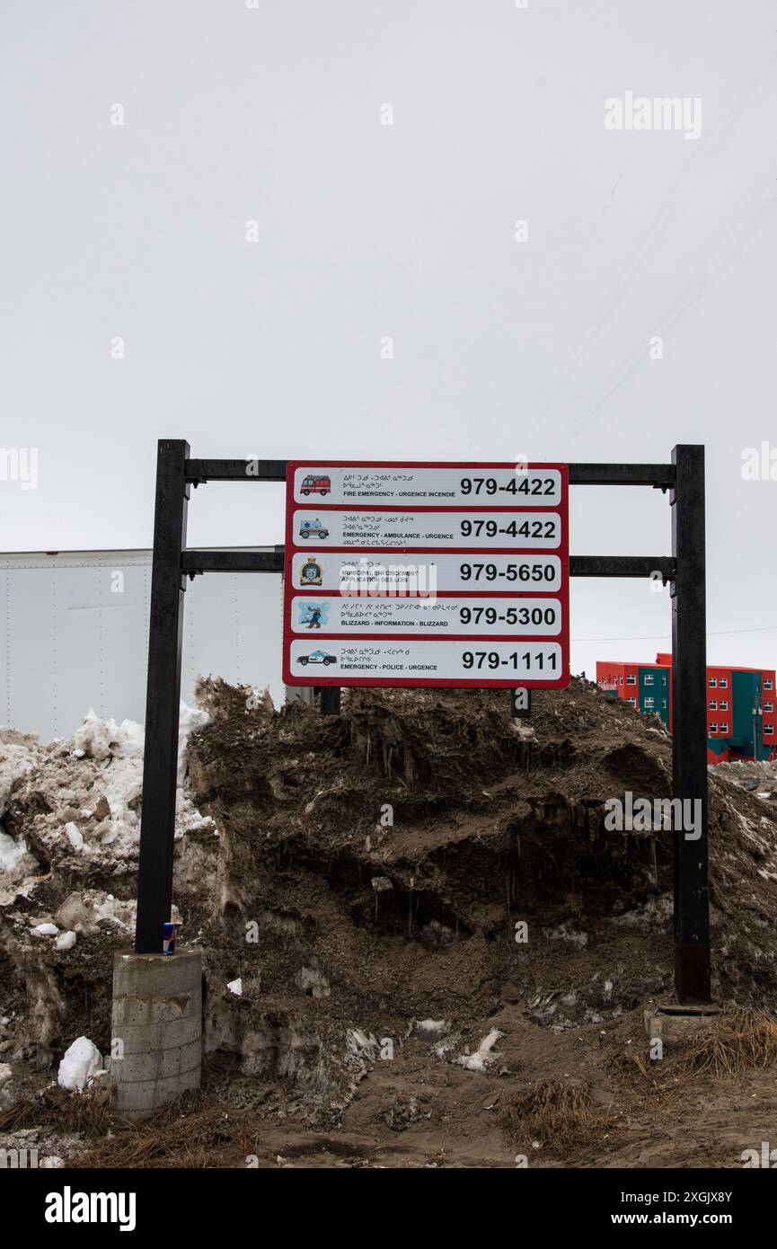 Multilingual emergency telephone numbers sign in English, French and ...