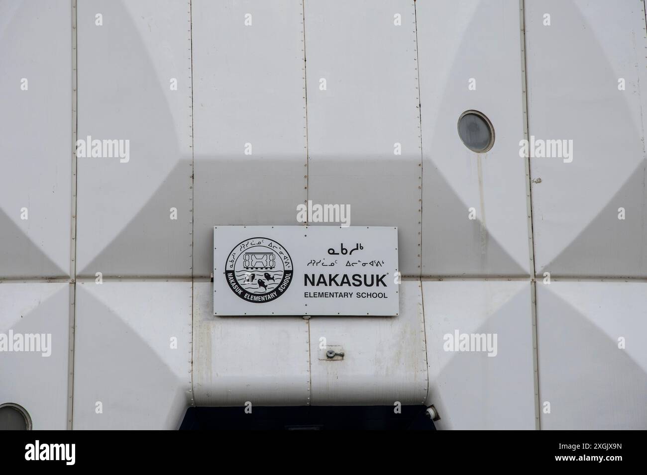 Bilingual Nakasuk Elementary School sign in English and Inuktitut on ...