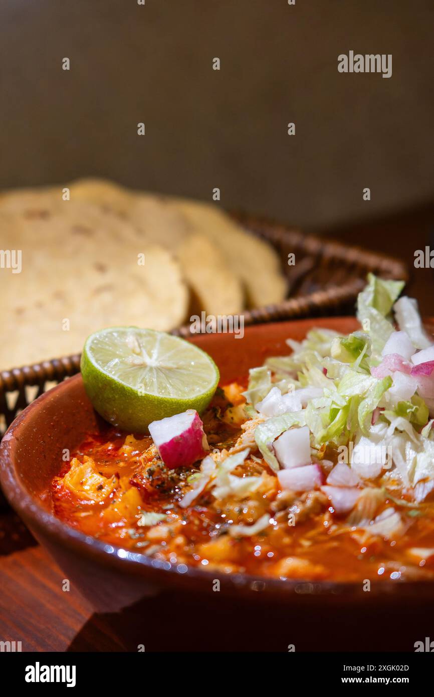 Delicious plate of traditional Mexican red pozole with radish, lettuce ...