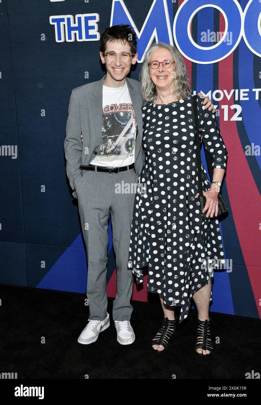 Noah Robbins, left, and mother attend the world premiere of "Fly Me to ...