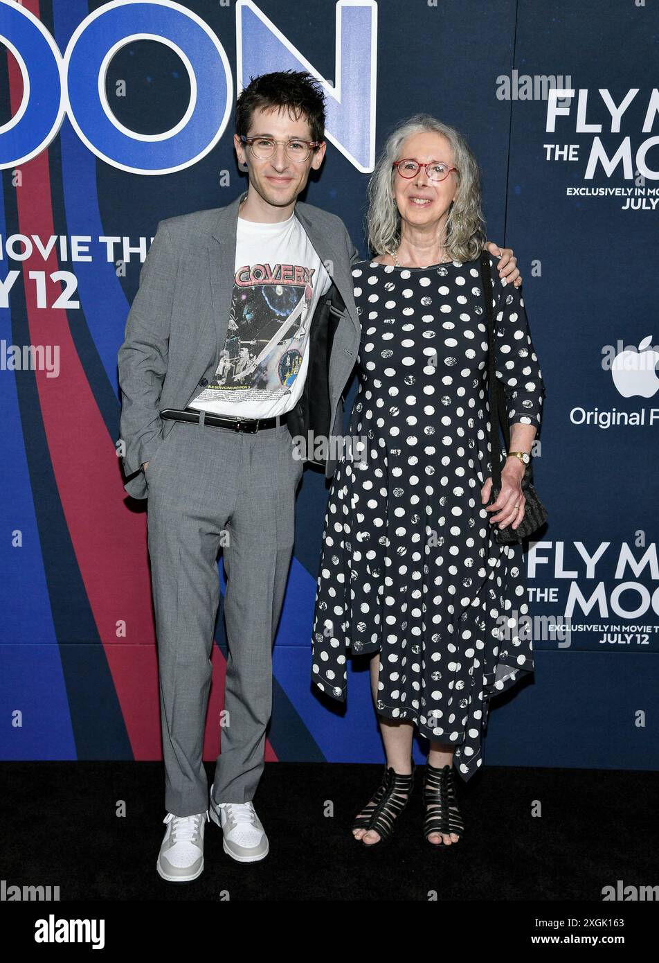 Noah Robbins, left, and mother attend the world premiere of "Fly Me to ...