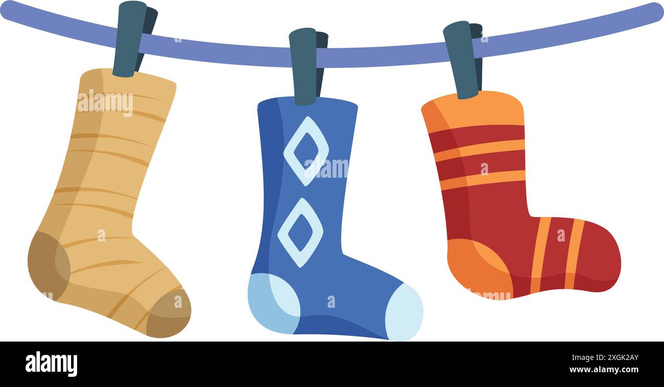Three colorful socks are hanging on a clothesline, drying after being ...