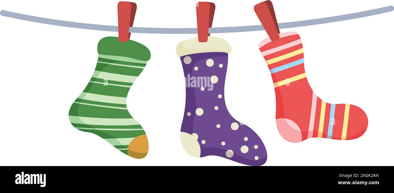 Three empty colorful christmas stockings are hanging on a clothesline ...