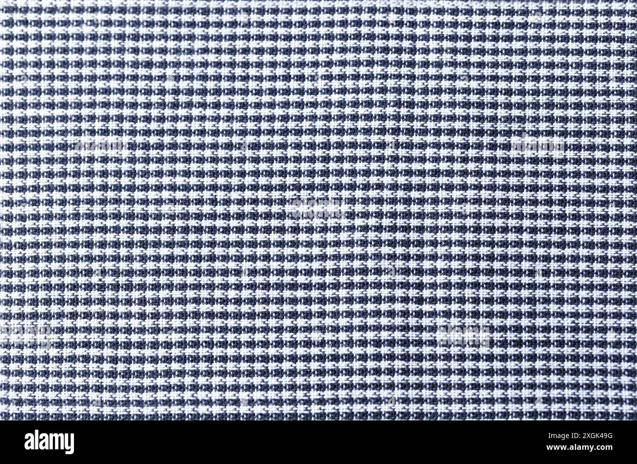 A checkered print fabric with a black and white color combination. The ...