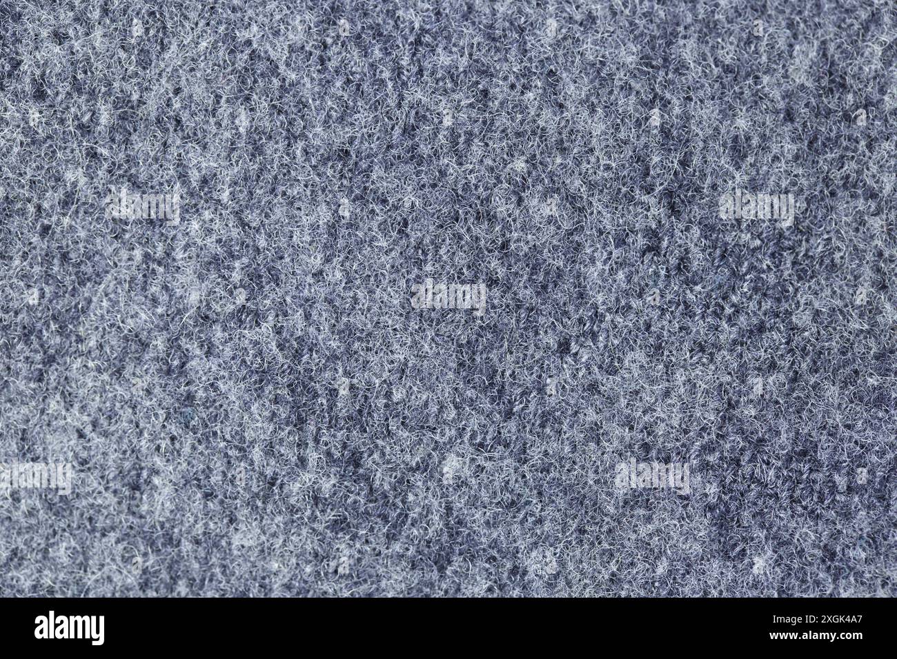 Detail of thick gray fabric texture. You can see the white and gray ...