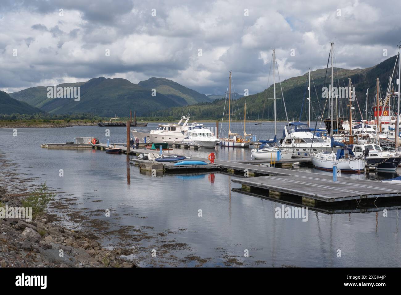 Sailing boats moored at the Holy Loch Marina, near Dunoon, Argyll and ...