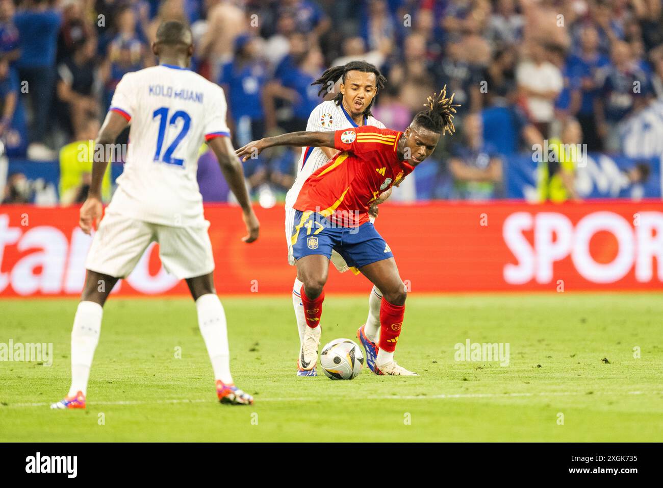Munich, Germany. 09th July, 2024. Nico Williams (17) of Spain and Jules ...