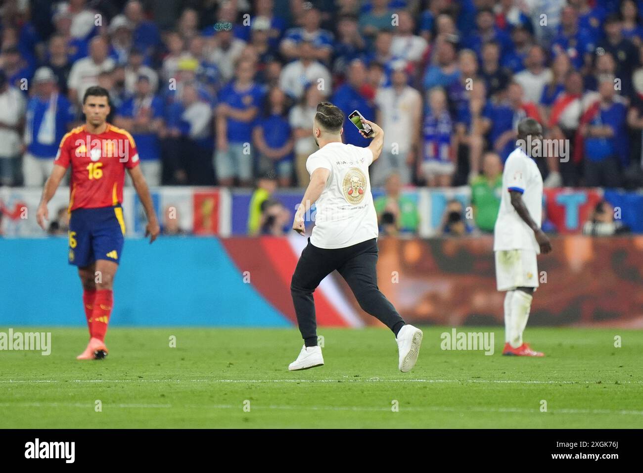 A pitch invader during the UEFA Euro 2024, semi-final match at the Munich Football Arena ...