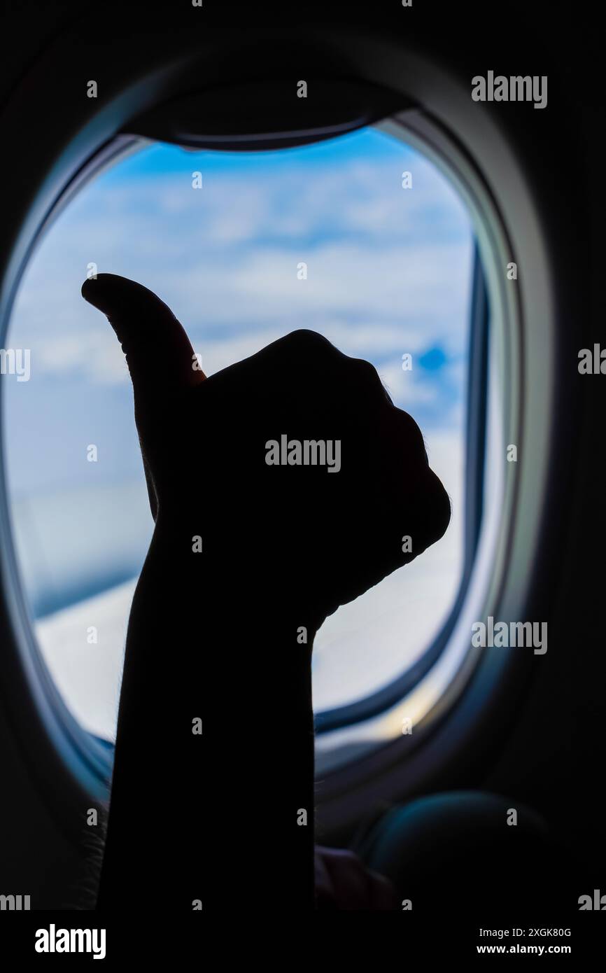 Airplane thumbs hi-res stock photography and images - Alamy