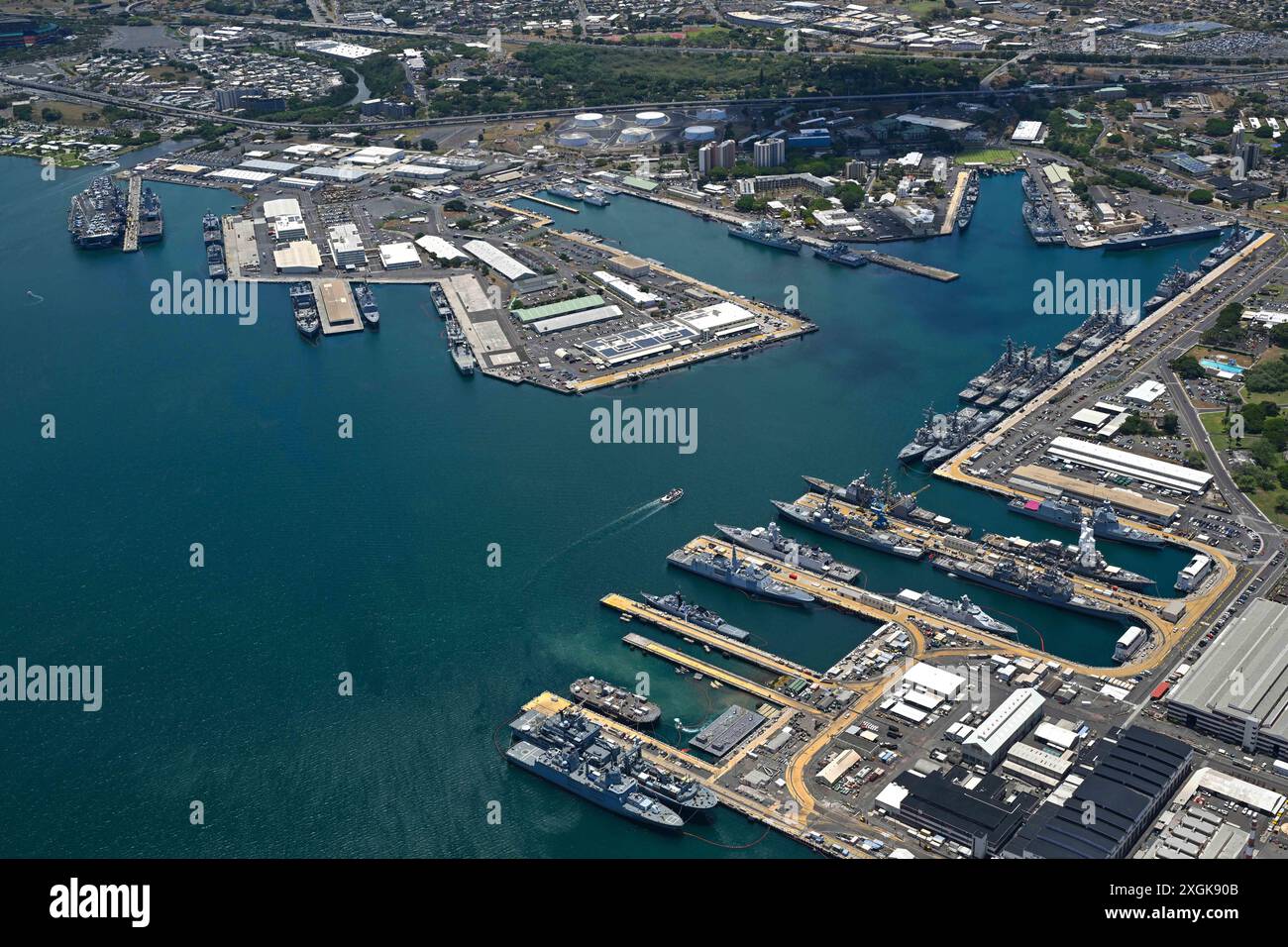 July 5, 2024 - Honolulu, Hawaii, USA - An aerial view of ships moored ...