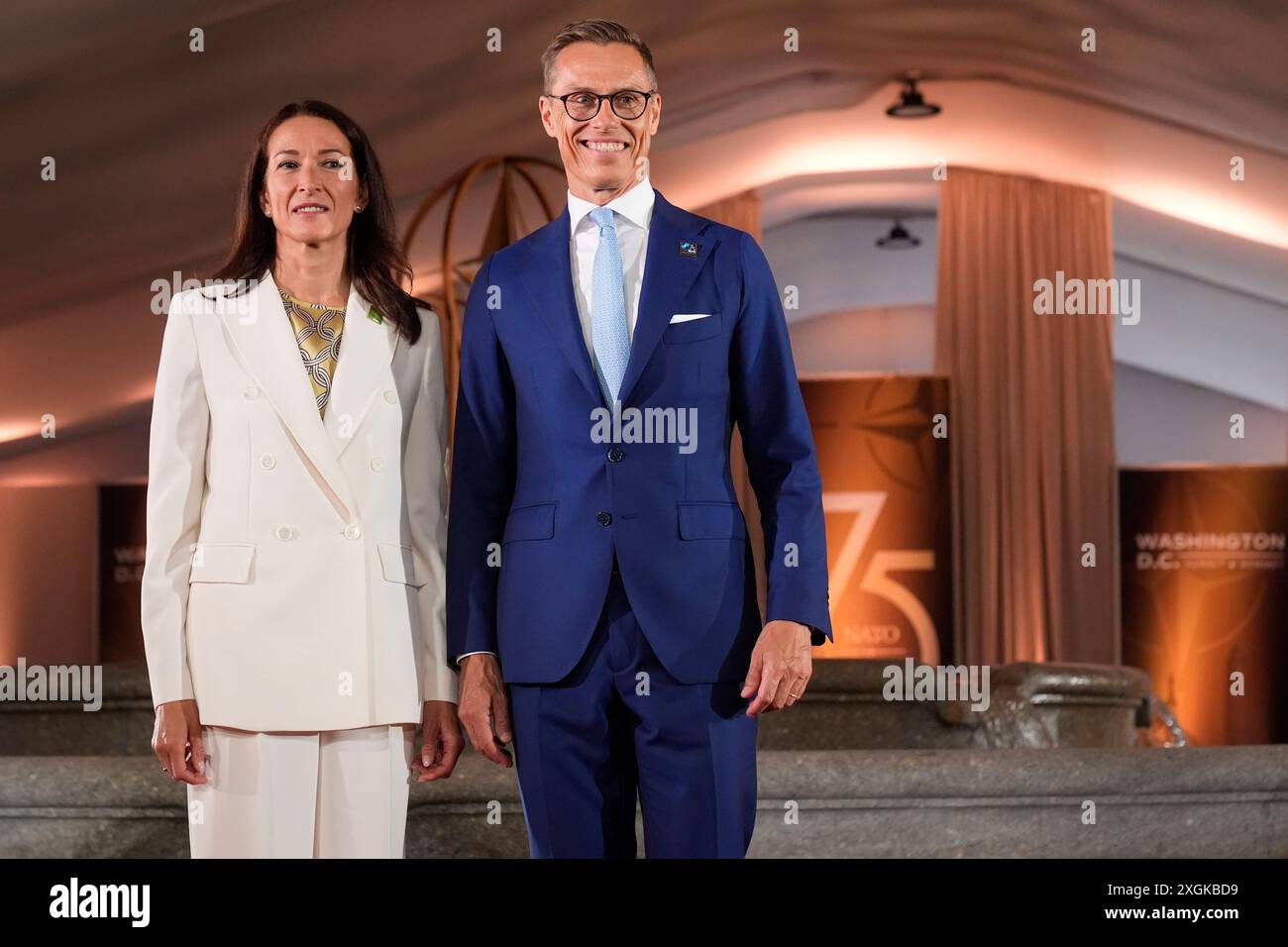 Finland's President Alexander Stubb and his wife Suzanne Innes-Stubb arrive at an event ...