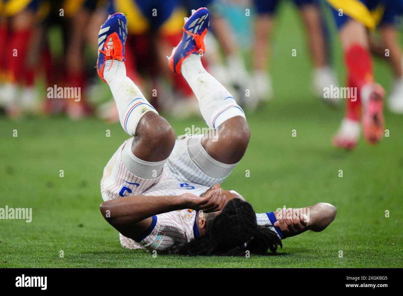 France's Jules Kounde reacts after losing the UEFA Euro 2024, semi ...