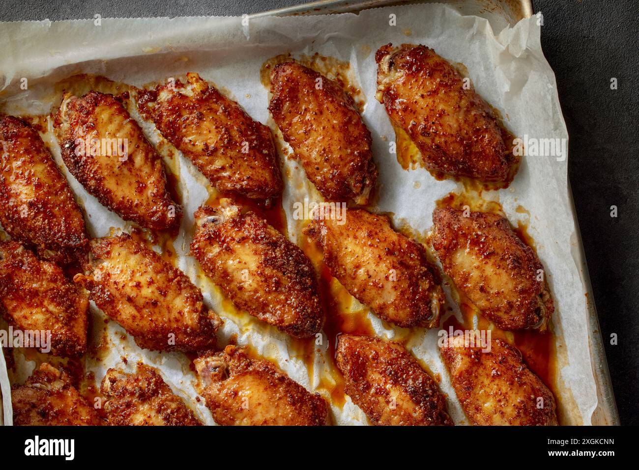 closeup of baked crispy spicy chicken wings, top view Stock Photo - Alamy