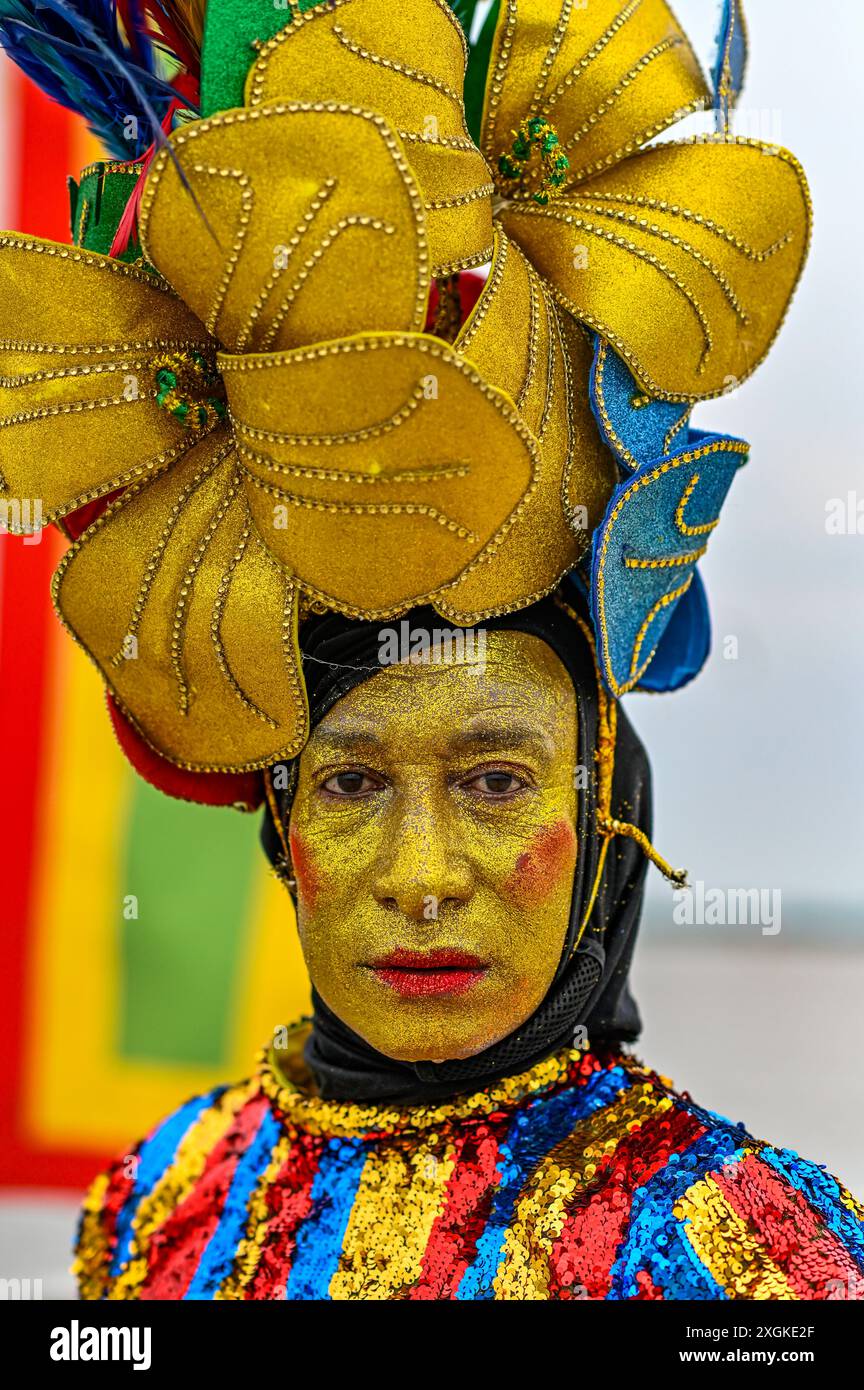 A captivating portrait of a performer dressed in traditional Carnival ...